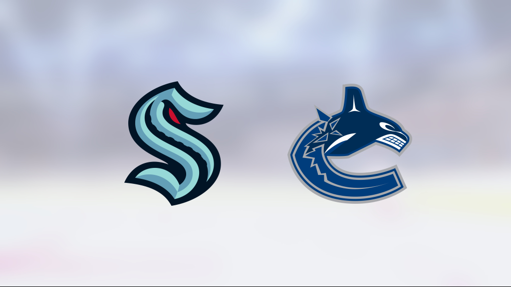 First win of the season for Canucks